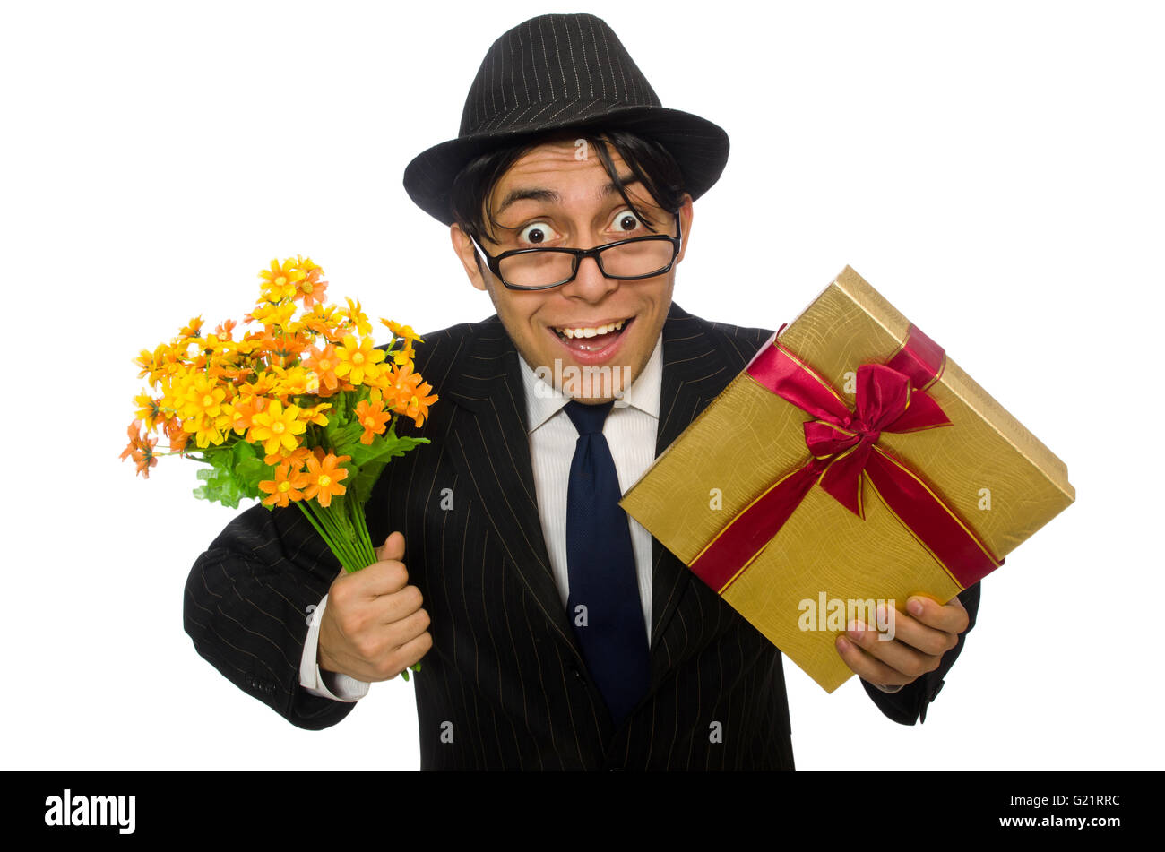 Funny man with flowers and giftbox Stock Photo - Alamy