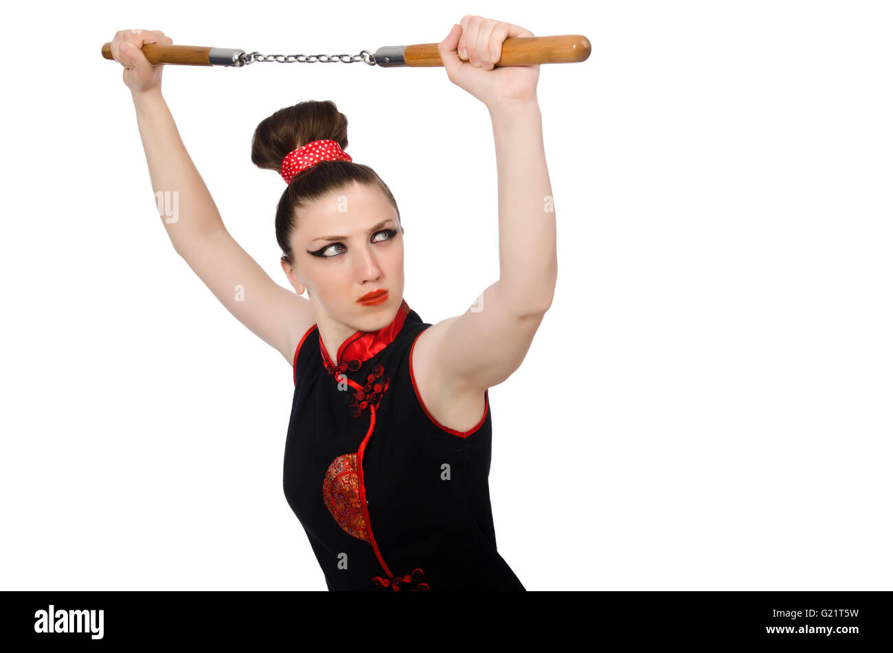 Funny woman with nunchucks isolated on white Stock Photo - Alamy