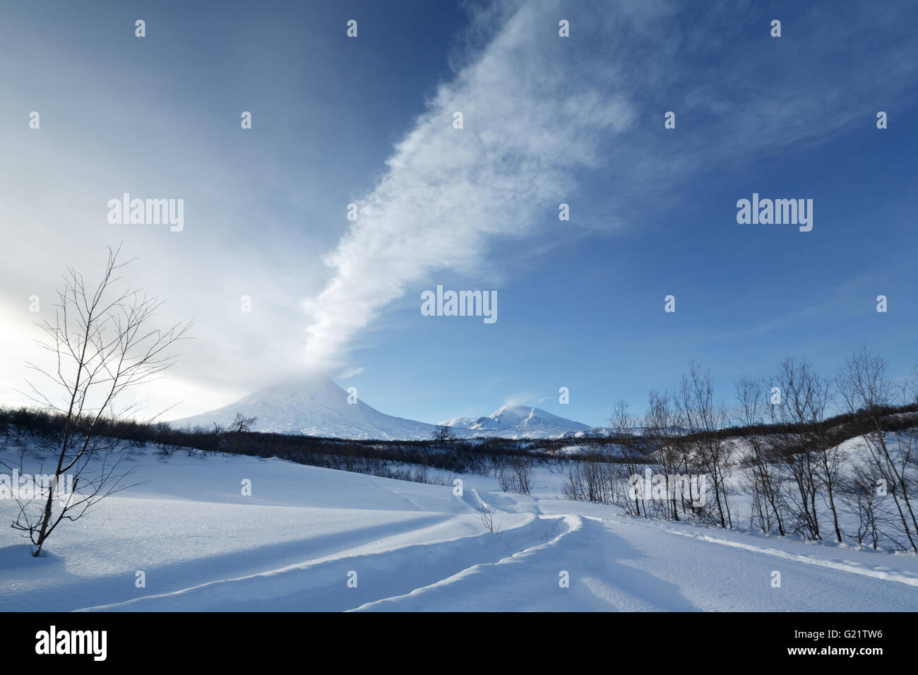 Volcanic landscape of Kamchatka Peninsula: evening view of eruption ...