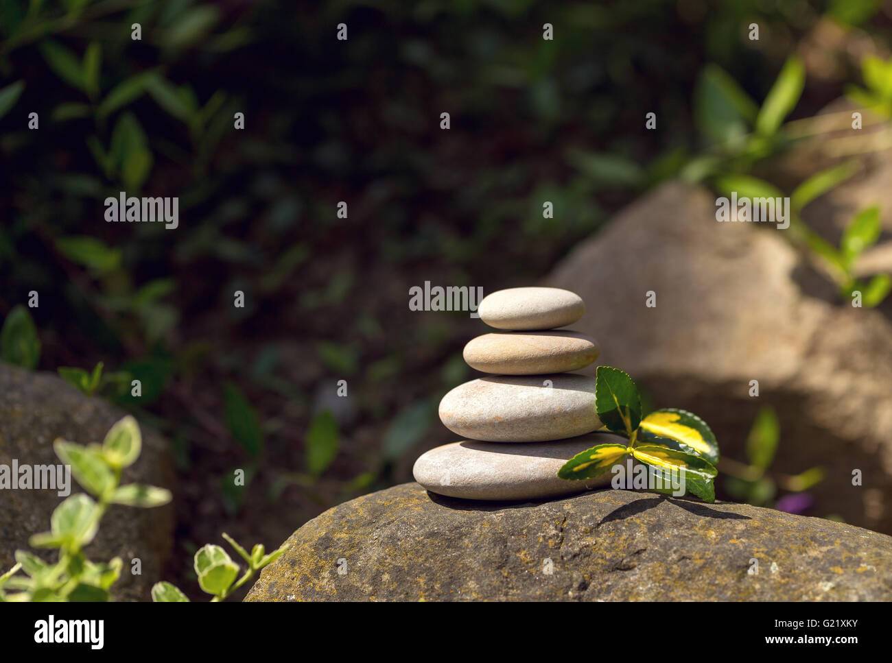Pile of balancing pebble stones, like ZEN stone, outdoor in spring, spa ...