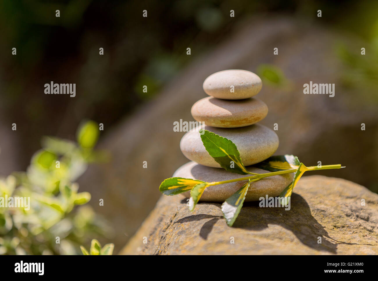 Pile of balancing pebble stones, like ZEN stone, outdoor in spring, spa ...