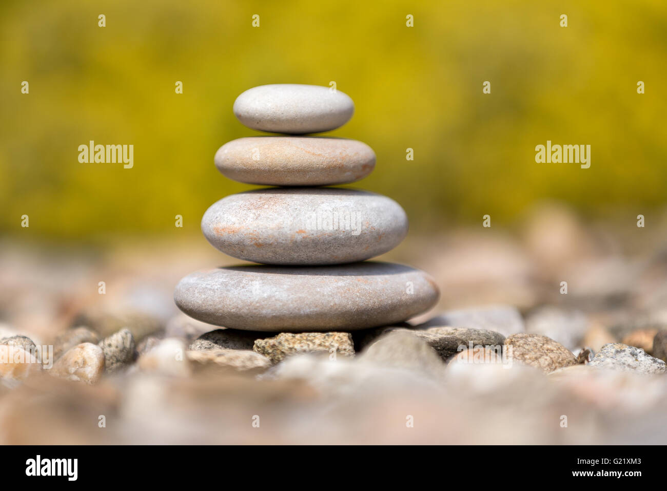 Pile of balancing pebble stones, like ZEN stone, outdoor in spring, spa ...
