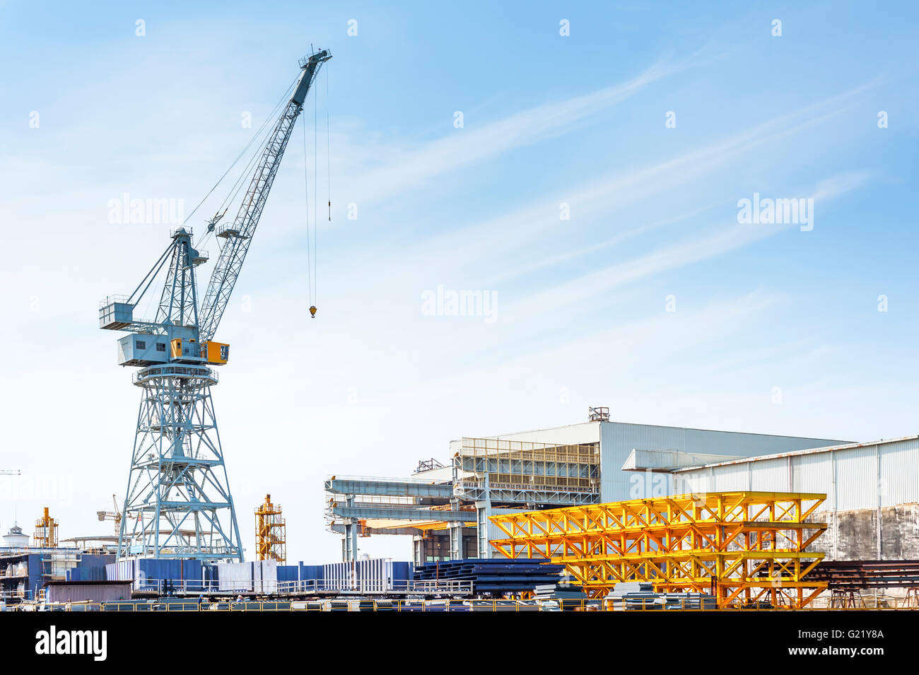 Cranes at work in the shipyard in Trieste Stock Photo - Alamy