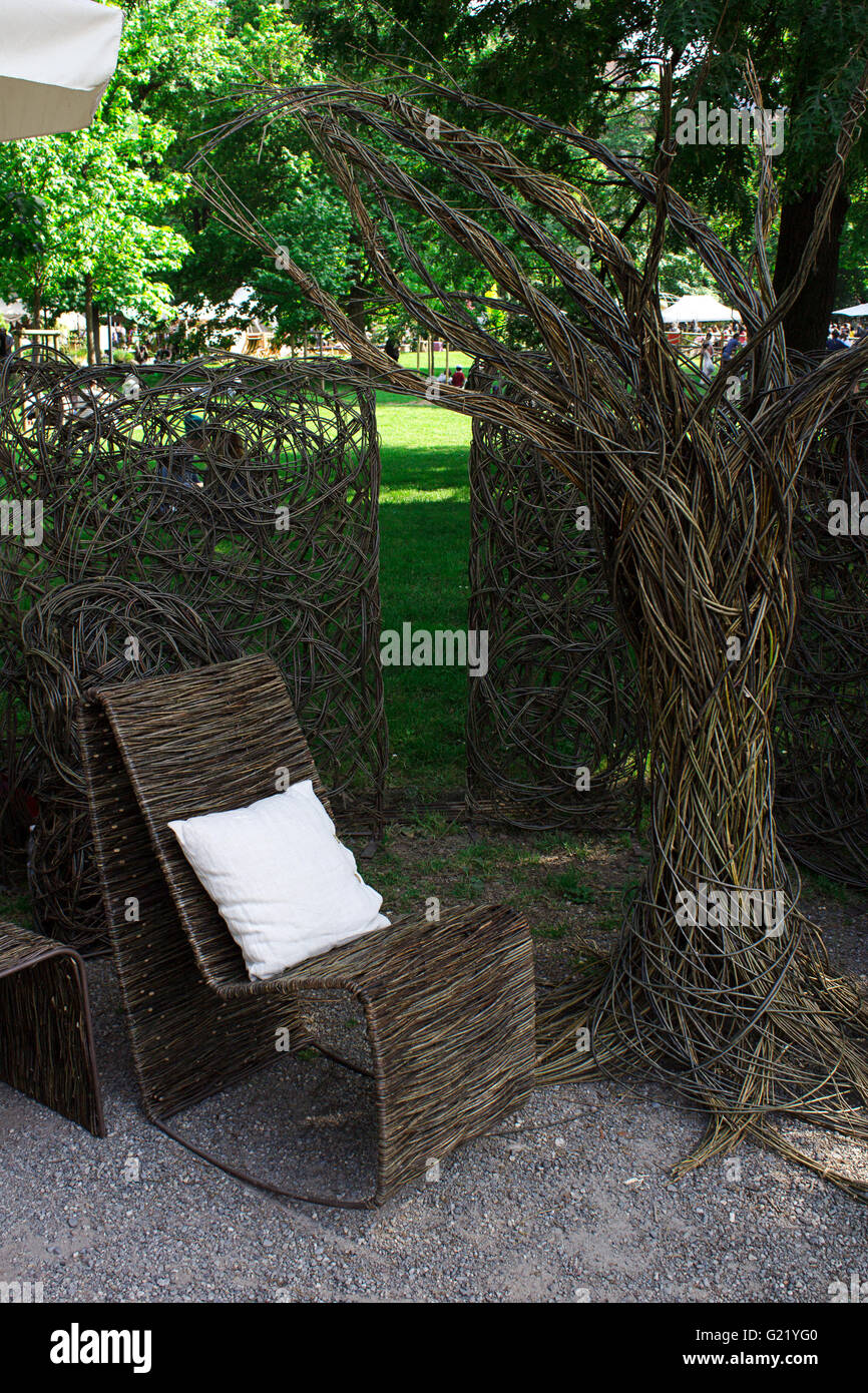 Samples of garden decor, such as wooden chair and tree in a wonderful ...