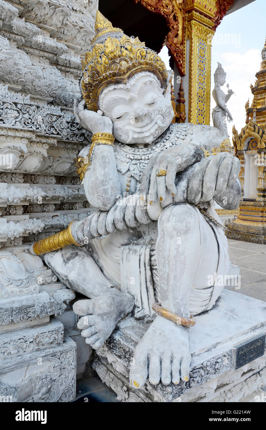 Thai Giant or Yak sleeping Guardian statue in church of Wat Phra That ...
