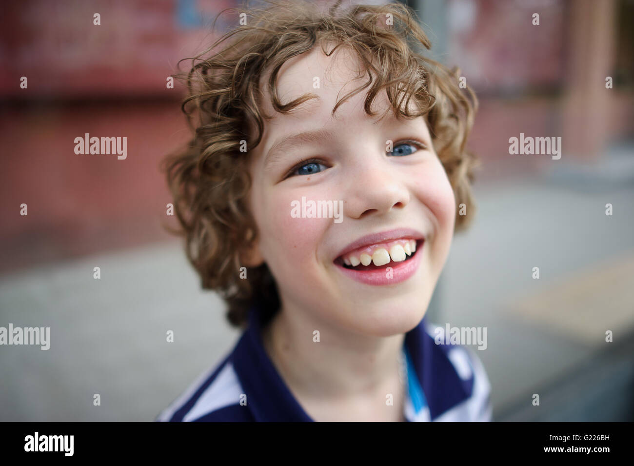 The boy happily smiling Stock Photo - Alamy