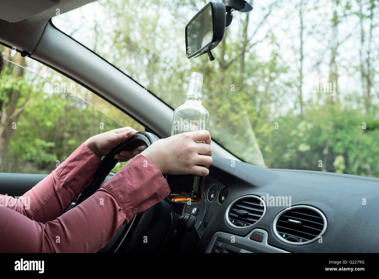 picture of woman drinking alcohol in the car Stock Photo - Alamy