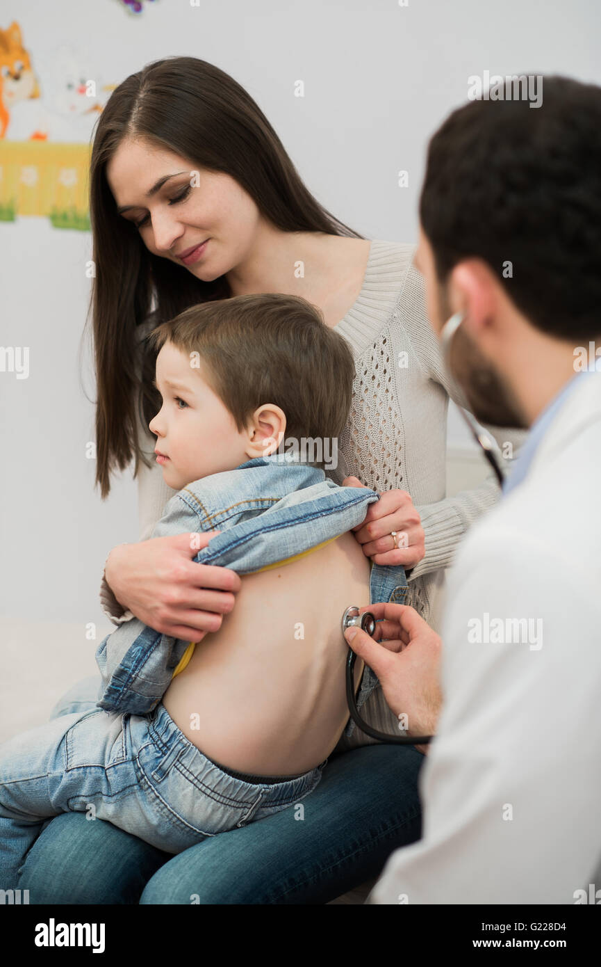 Child having physical and medical examination by docto Stock Photo - Alamy