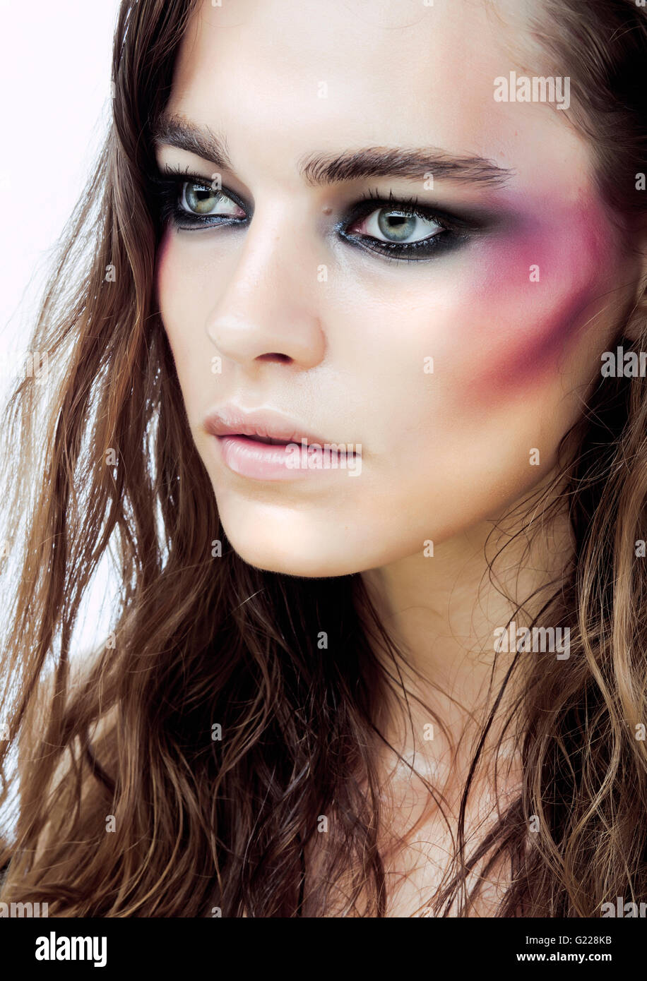 young beauty woman with makeup like shiner on face close up isolated ...