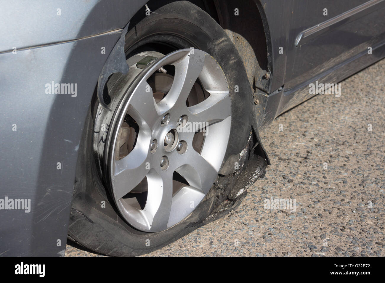 shredded tire of a car Stock Photo - Alamy