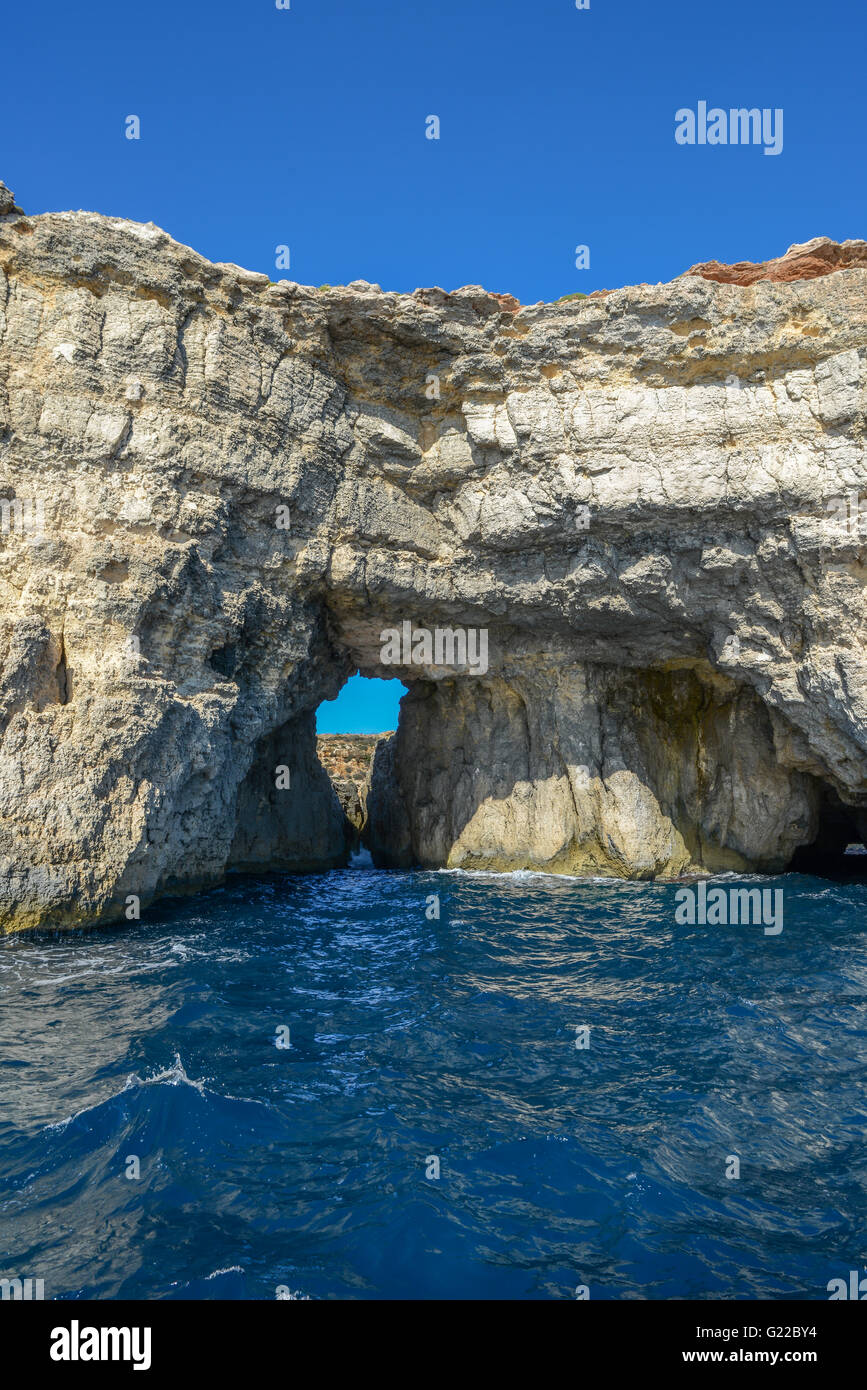 Natural window at the rocky cliffs on Gozo / Malta Stock Photo - Alamy