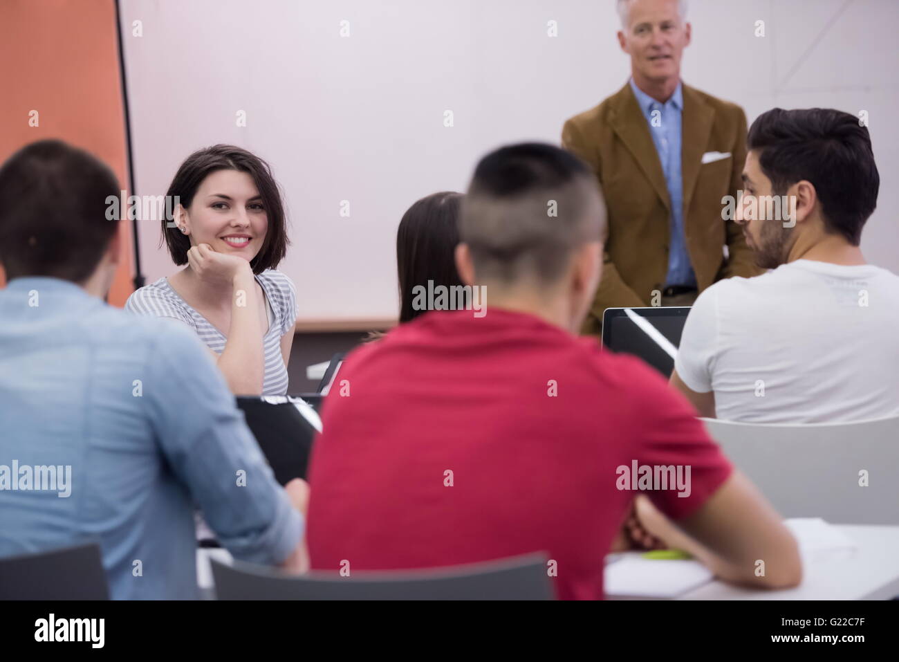 technology students group in computer lab school classroom working on ...
