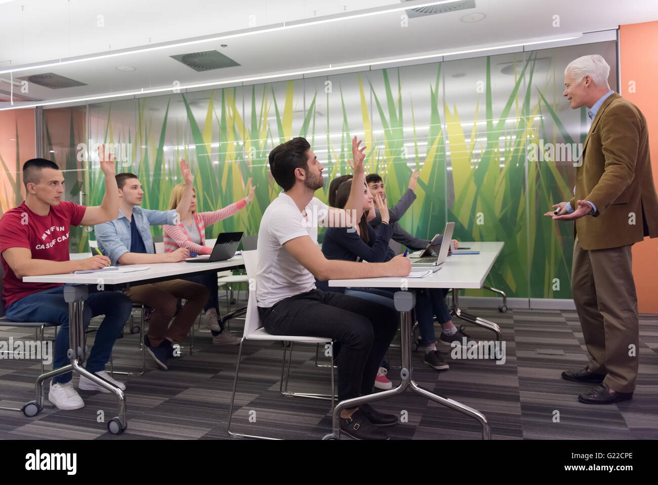 group of students study with professor in modern school classroom Stock ...
