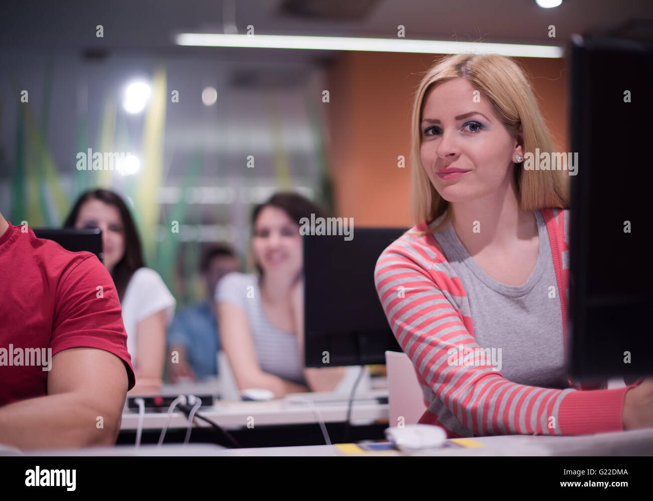 technology students group in computer lab school classroom working on ...