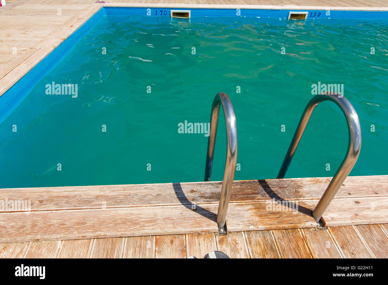 Swimming pool. Blue spa swimming pool with clean water Stock Photo - Alamy