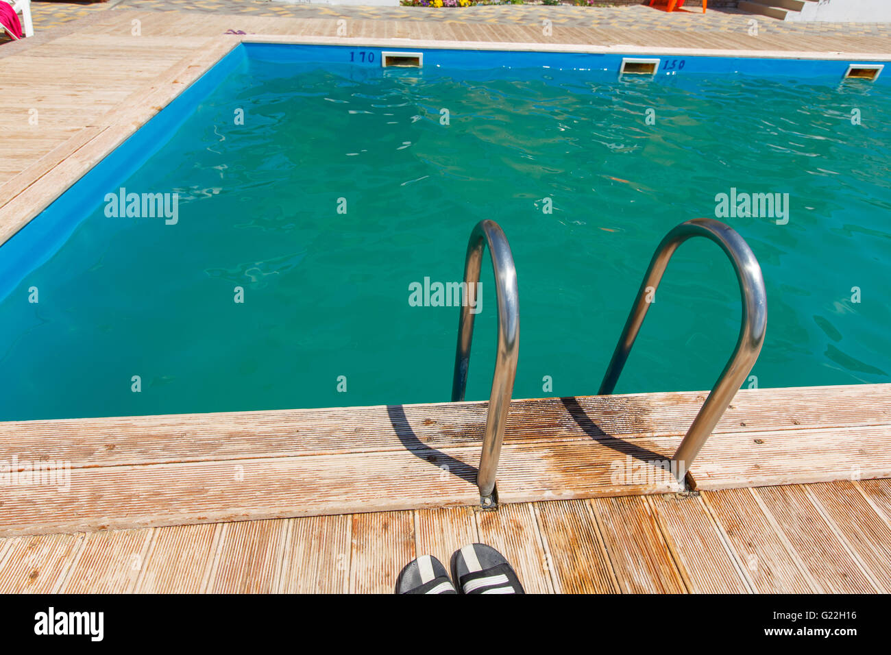 Swimming pool. Blue spa swimming pool with clean water Stock Photo - Alamy