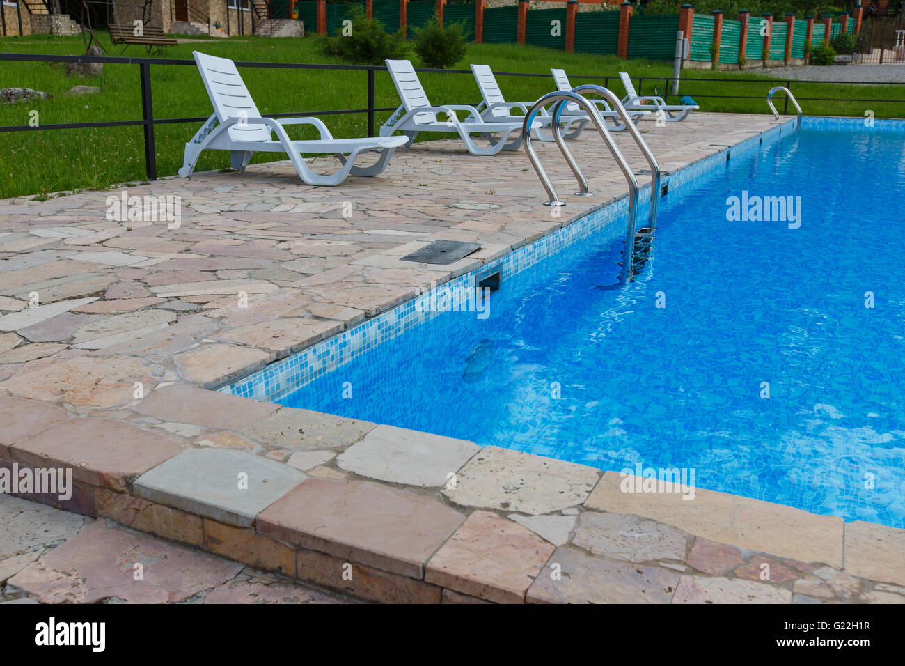 Swimming pool. Blue spa swimming pool with clean water Stock Photo - Alamy