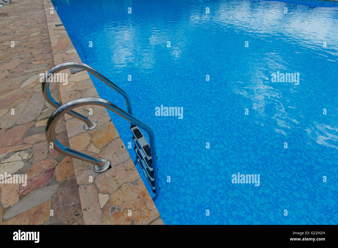Swimming pool. Blue spa swimming pool with clean water Stock Photo - Alamy