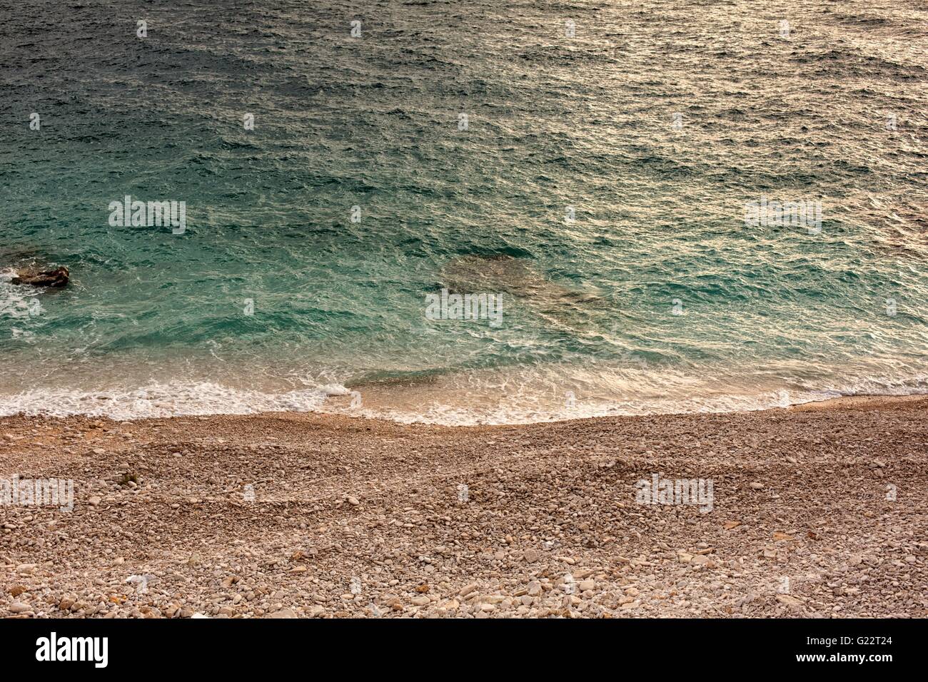 Sea and polished rocks closeup Stock Photo - Alamy