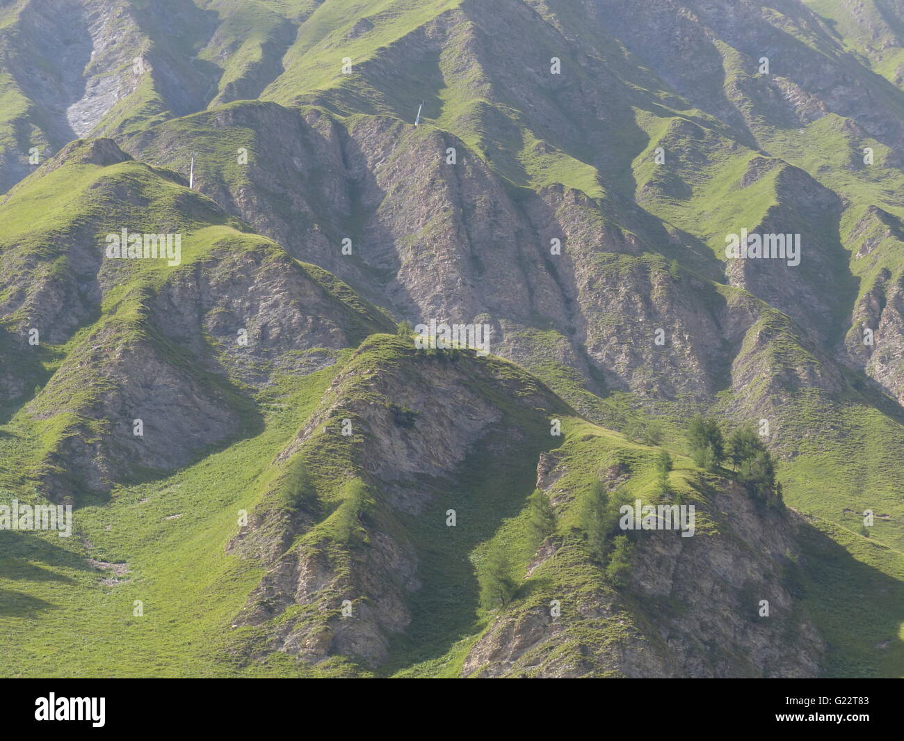 Switzeland - Samanun. Grass covered mountains Stock Photo - Alamy