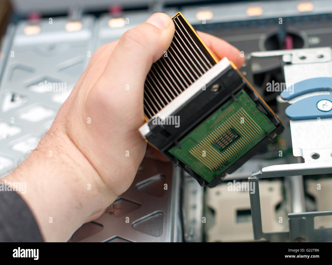Computer technician installing CPU into motherboard Stock Photo - Alamy