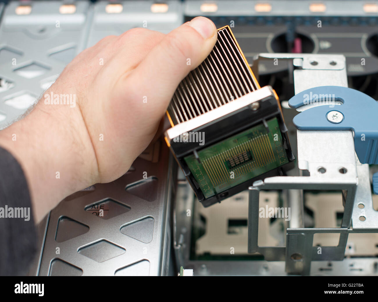 Computer technician installing CPU into motherboard Stock Photo - Alamy
