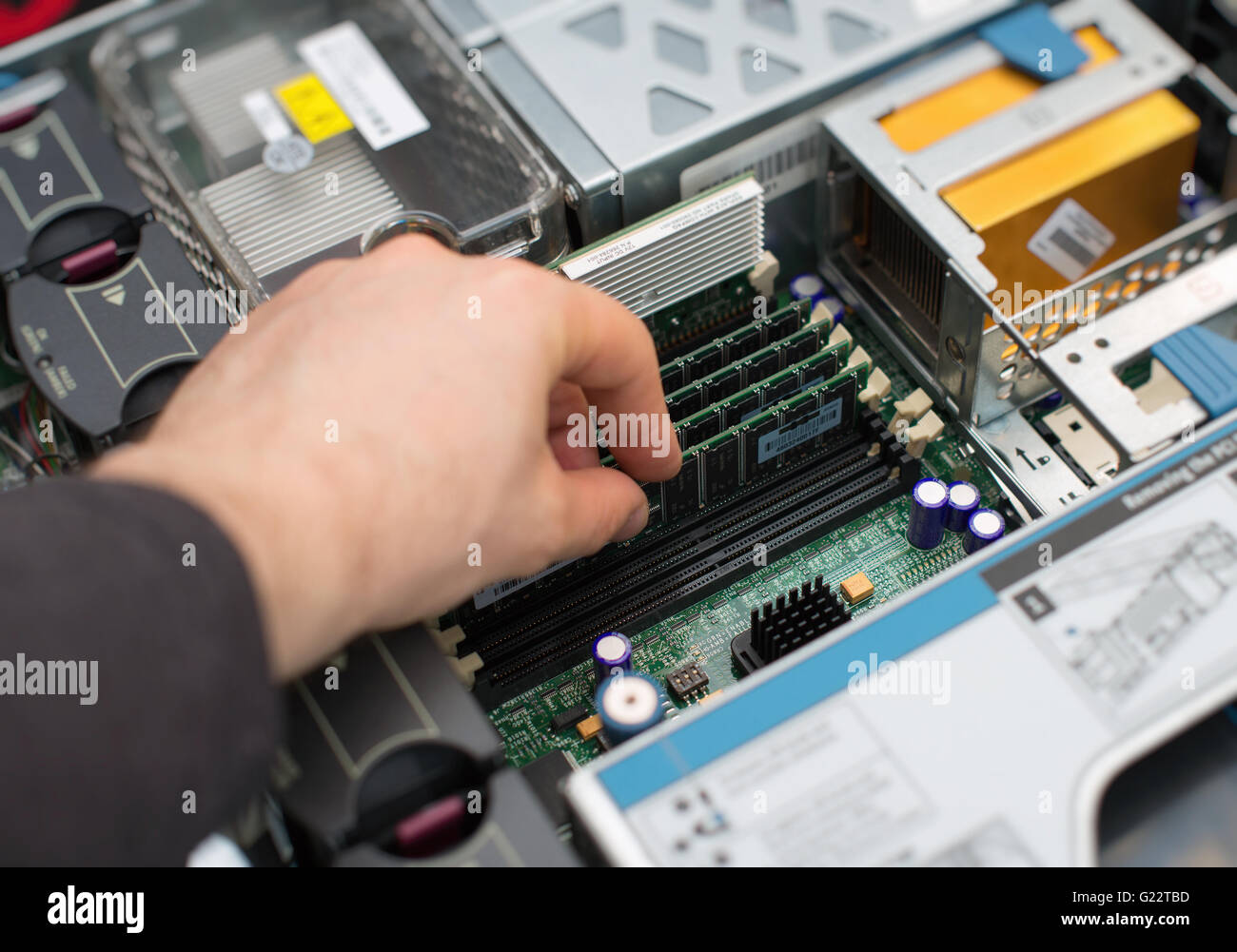 Computer technician installing RAM memory into motherboard Stock Photo ... Computer technician installing RAM memory into motherboard Stock Photo ...