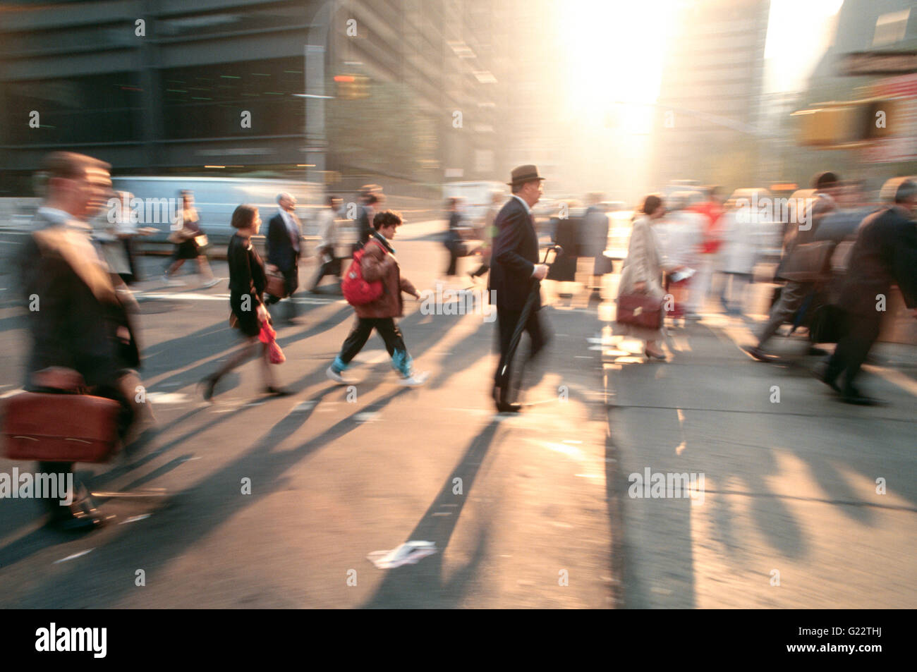 New York City, Wall Street, people rush to work, commuters, shadows ...