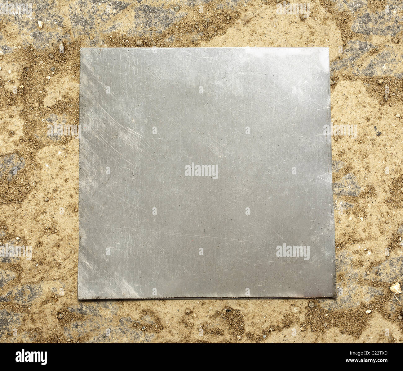 Blank square metal plate on stone background Stock Photo - Alamy