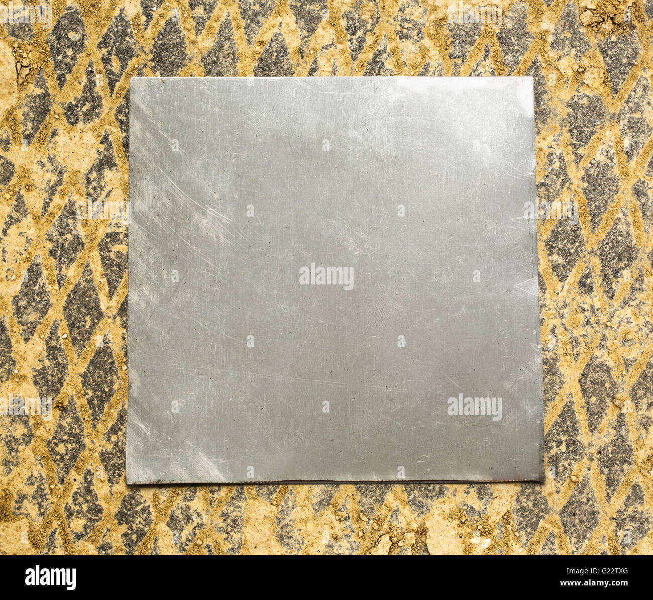 Blank square metal plate on stone background Stock Photo - Alamy