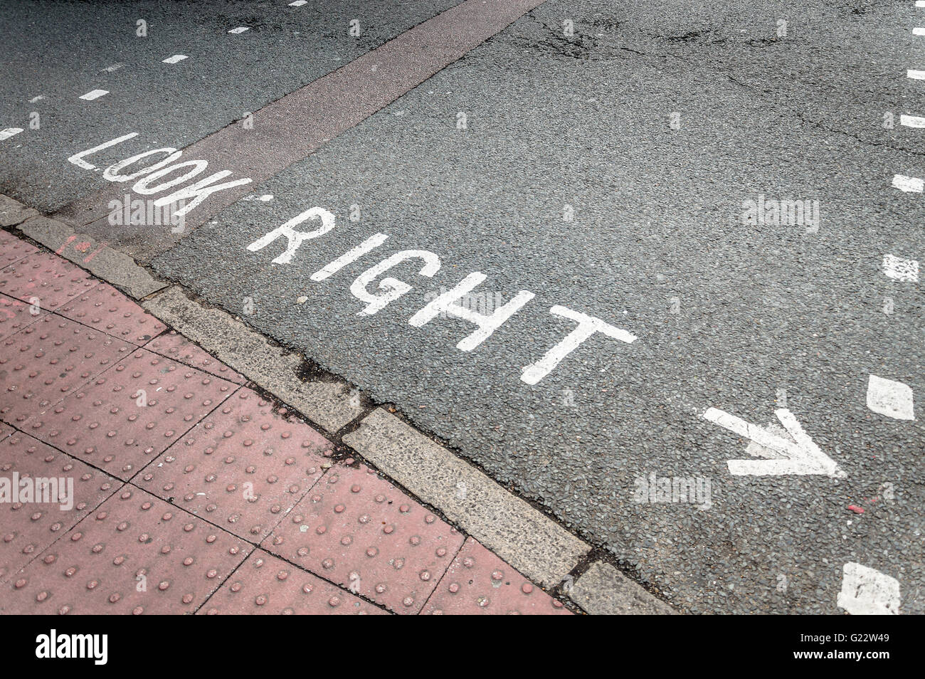 Look right sign painted on the road in London Stock Photo - Alamy