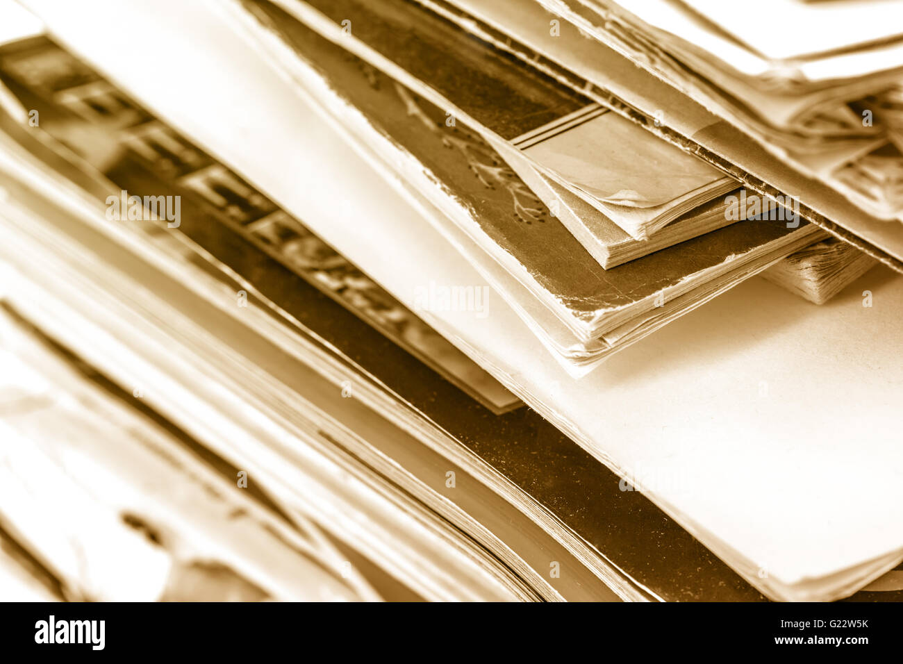 Stack of old books and magazines closeup Stock Photo - Alamy