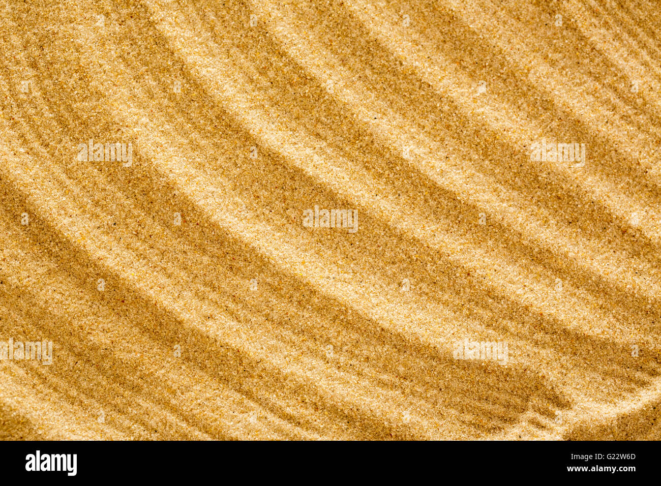 Waves of sand as nature background closeup Stock Photo - Alamy