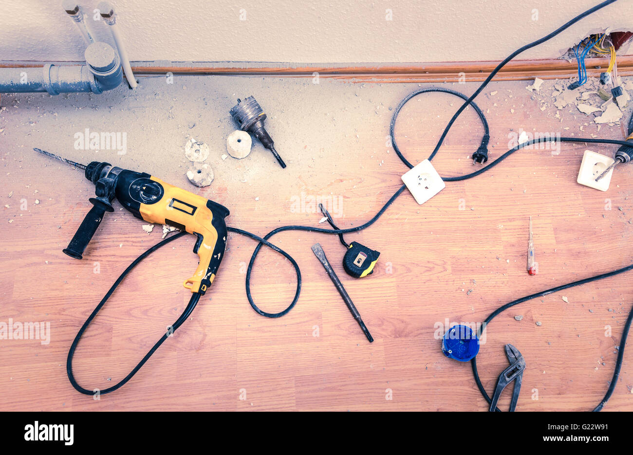 Place of electric socket repair process with drill Stock Photo - Alamy
