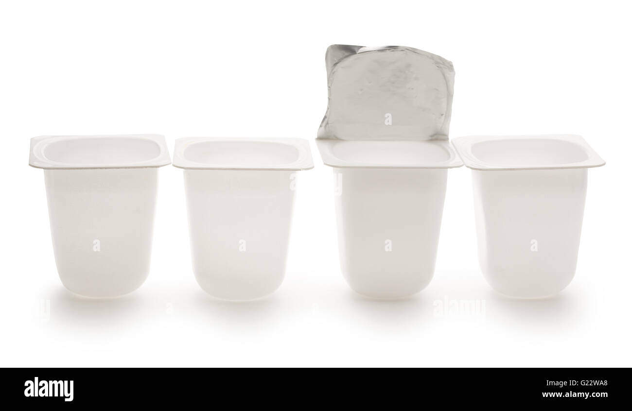 Empty crushed plastic yogurt pots on white Stock Photo - Alamy