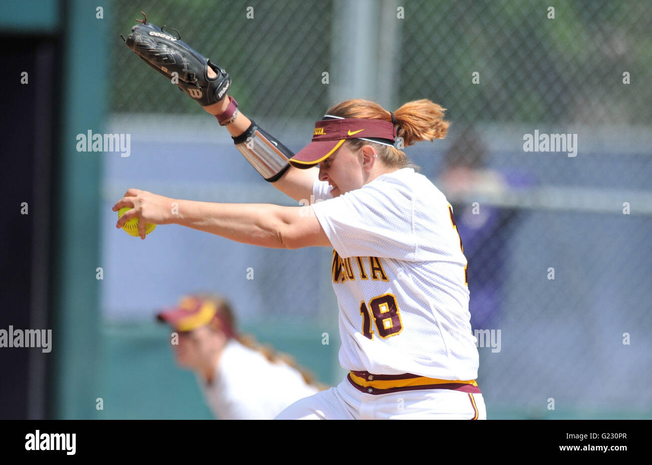 Minnesota's Nikki Anderson (18) throws a pitch during for a strike ...