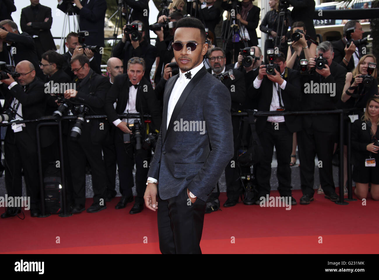 Lewis Hamilton poses for photographers upon arrival at the screening of ...