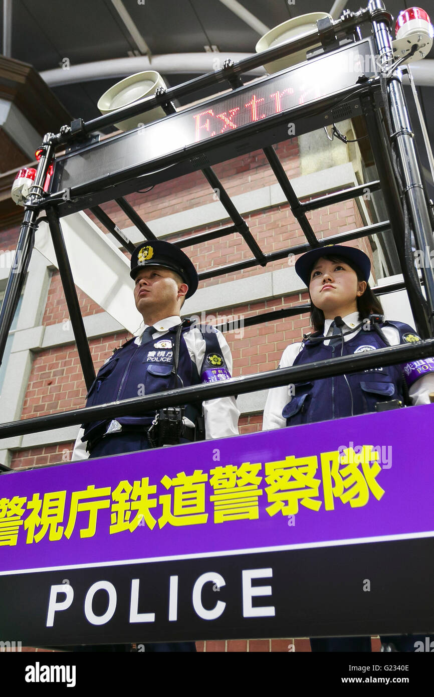 Police officers patrol from a stand during a presentation of the ...