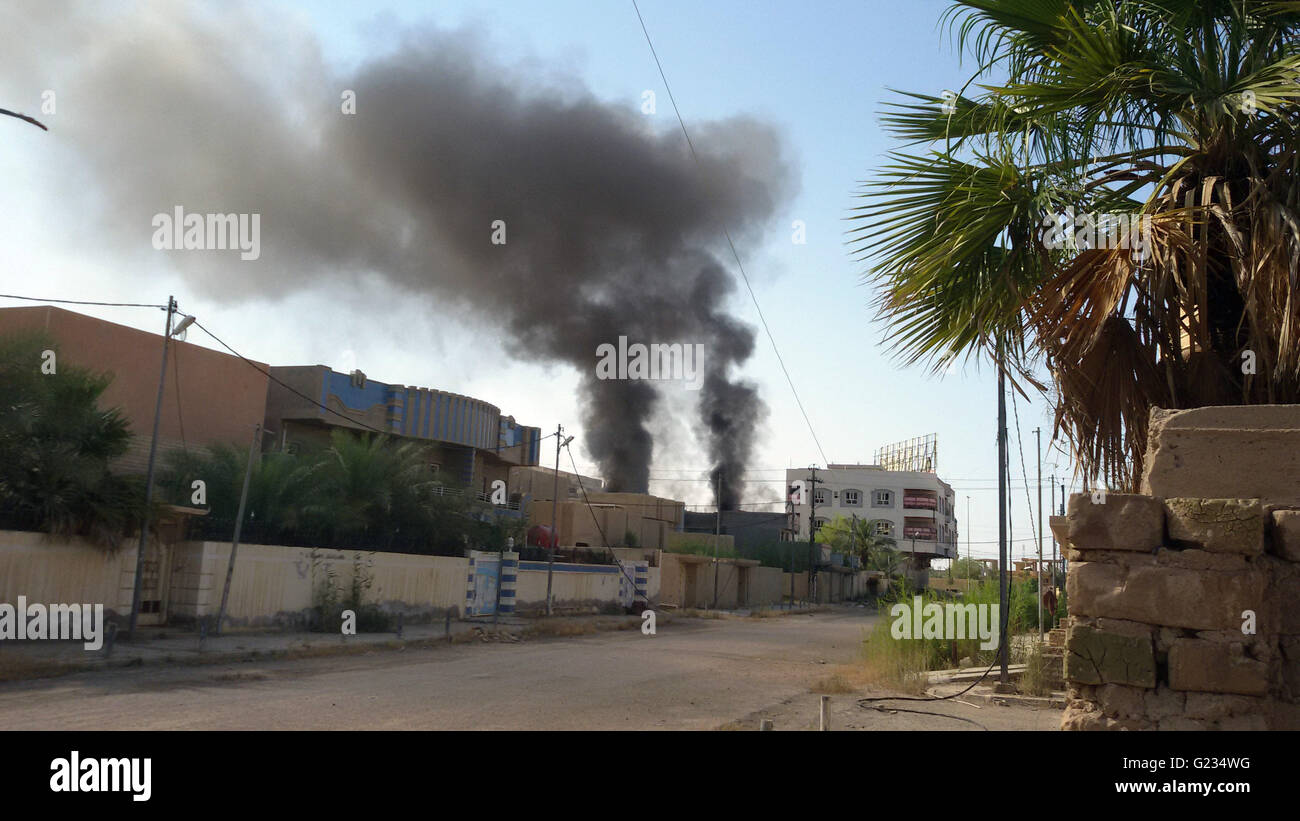 Fallujah, Iraq. 22nd May, 2016. Smoke rises after an airstrike by the ...