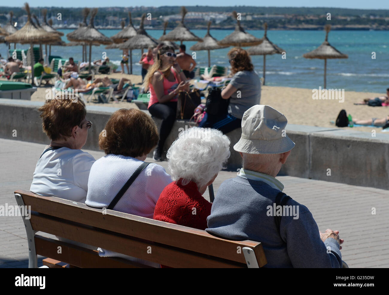 People look toward the beach of Playa de Palma in Arenal near Palma on ...