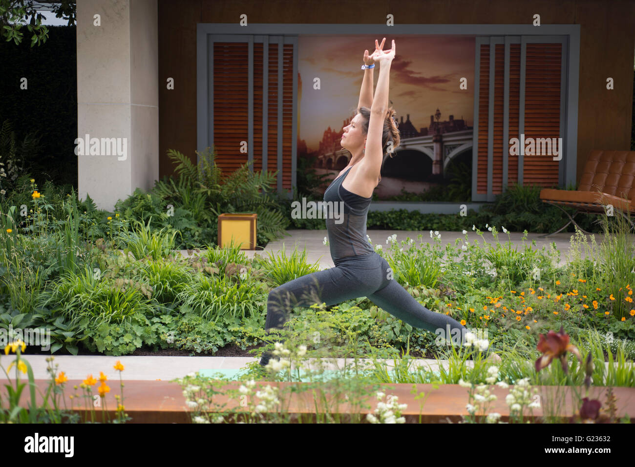 Chelsea, London UK. 23rd May 2016. Yoga practitioner on the Gold Medal ...