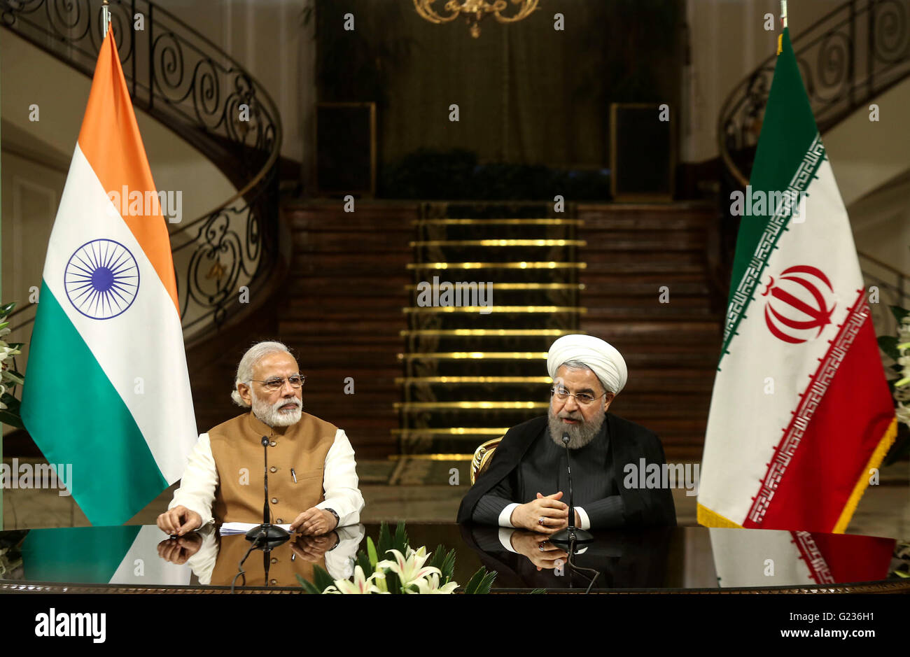 Tehran, Iran. 23rd May, 2016. Iranian President Hassan Rouhani (R) and ...