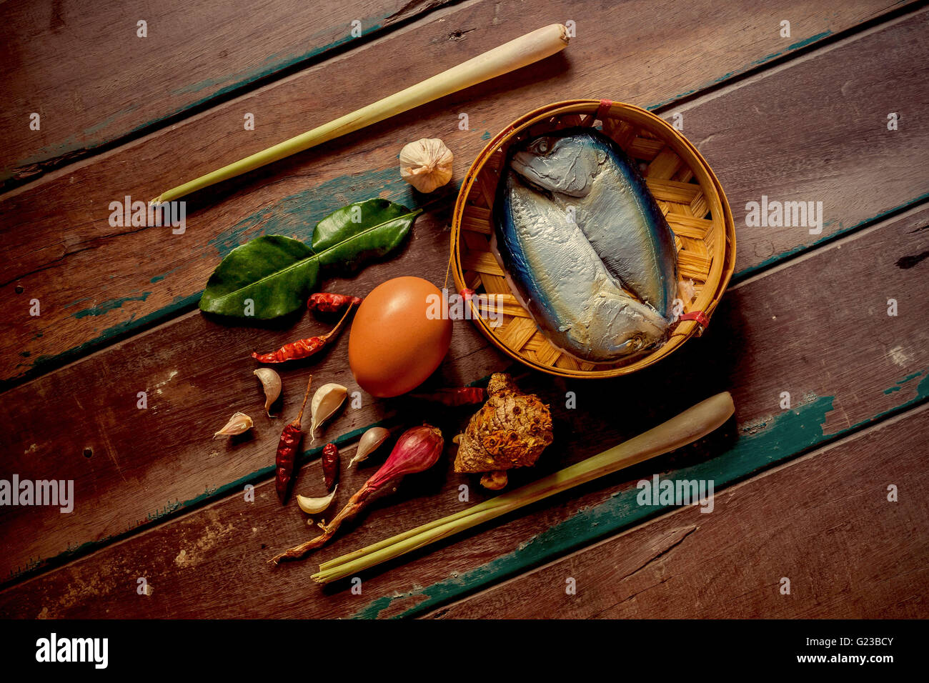 Fish and cooking on wood Stock Photo - Alamy
