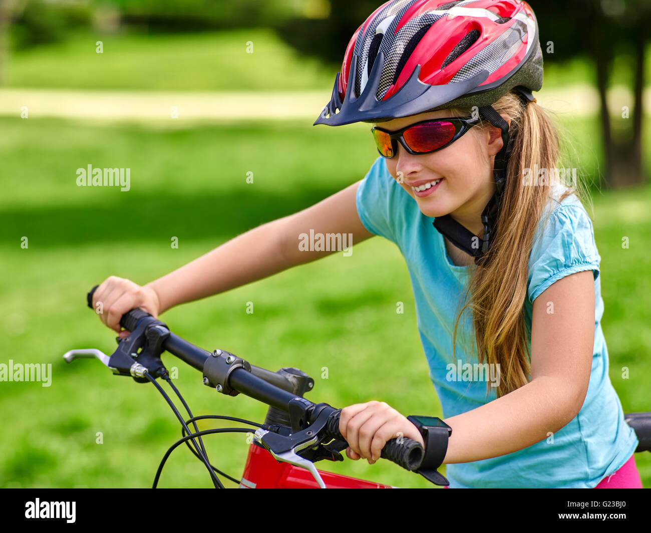 Girl long hair rides bicycle hi-res stock photography and images - Alamy