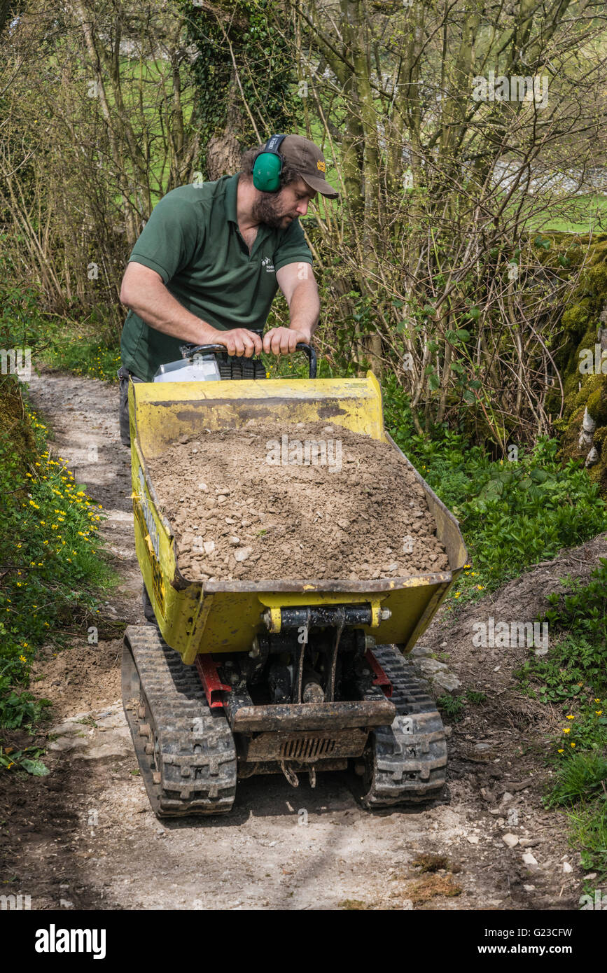 Men at work in the countryside Stock Photo - Alamy