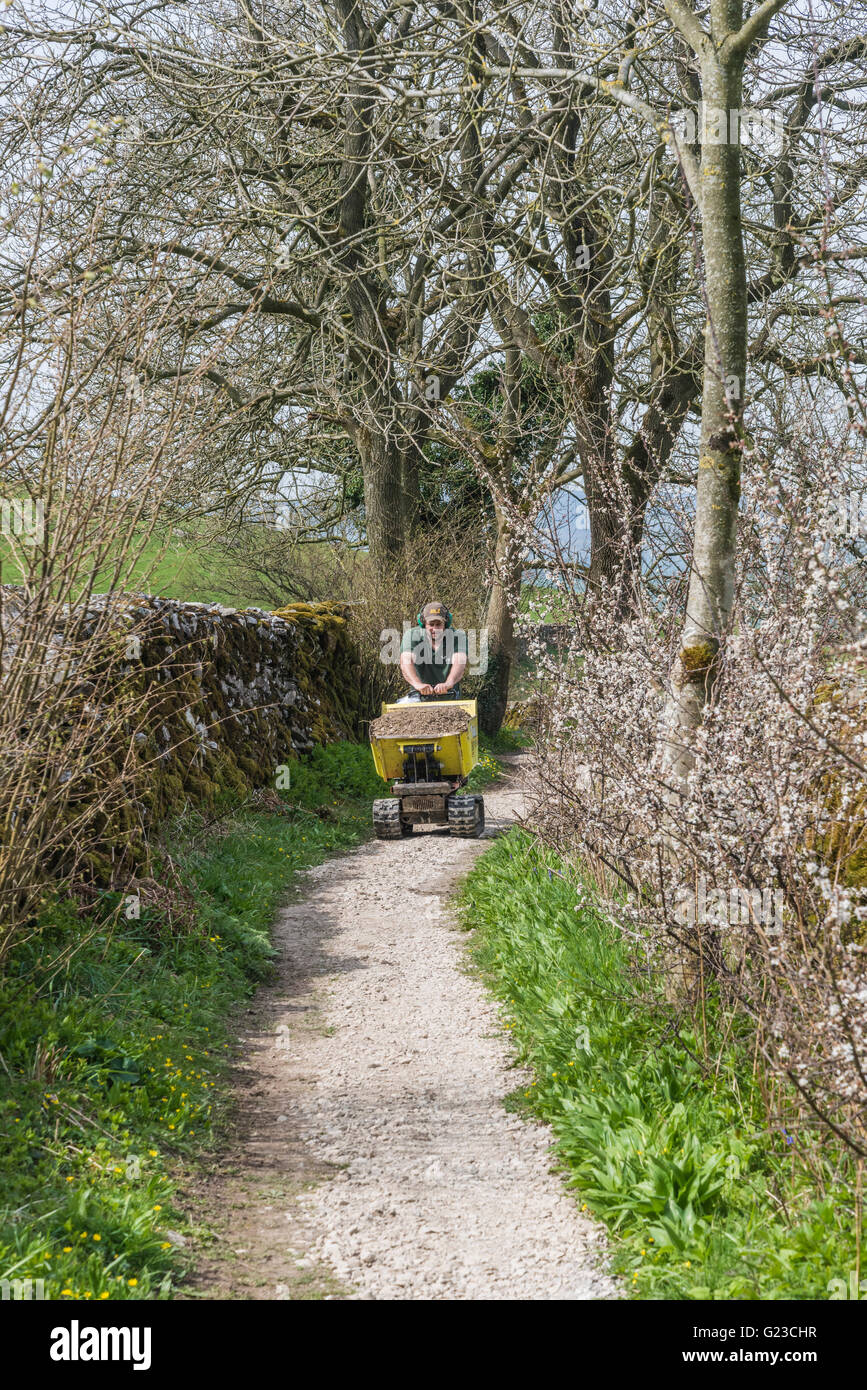 Men at work in the countryside Stock Photo - Alamy