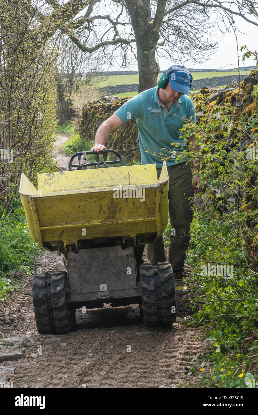 Men at work in the countryside Stock Photo - Alamy