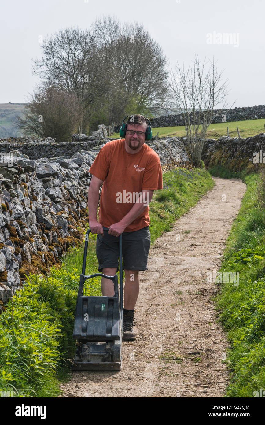 Men at work in the countryside Stock Photo - Alamy
