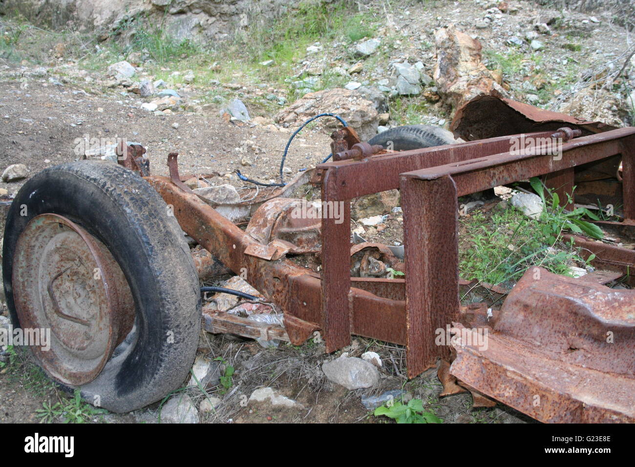 An old fallen car in the forest Stock Photo - Alamy
