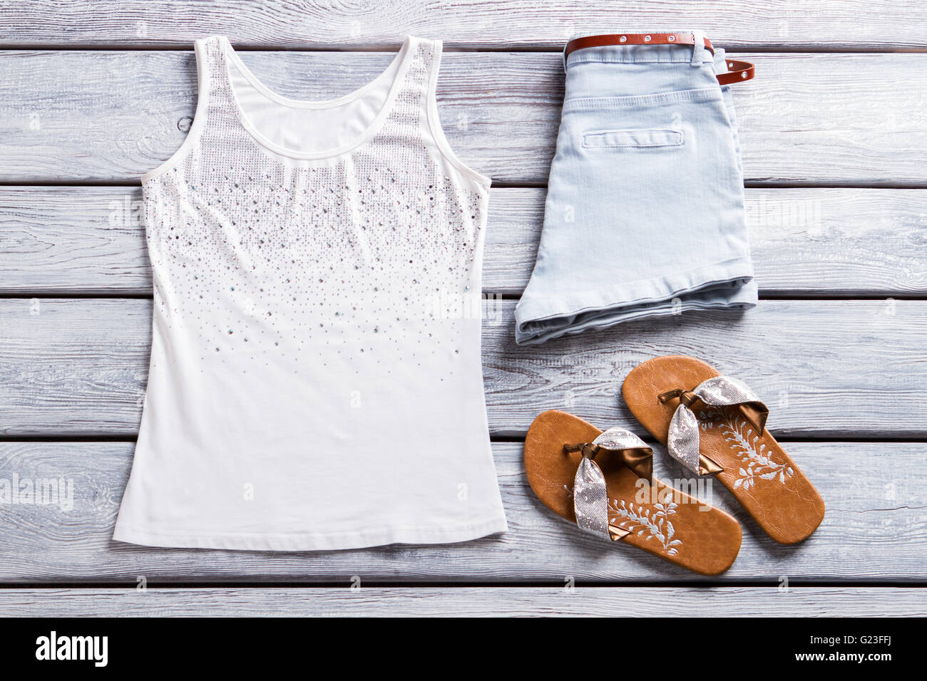 Tank top and flip flops Stock Photo - Alamy